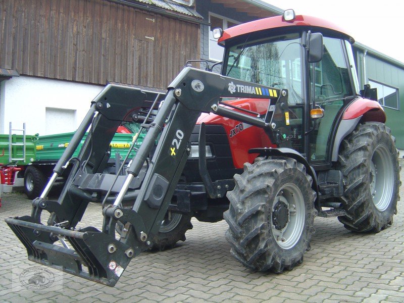 Case IH JX 70 mit Trima Frontlader Traktor - technikboerse.com